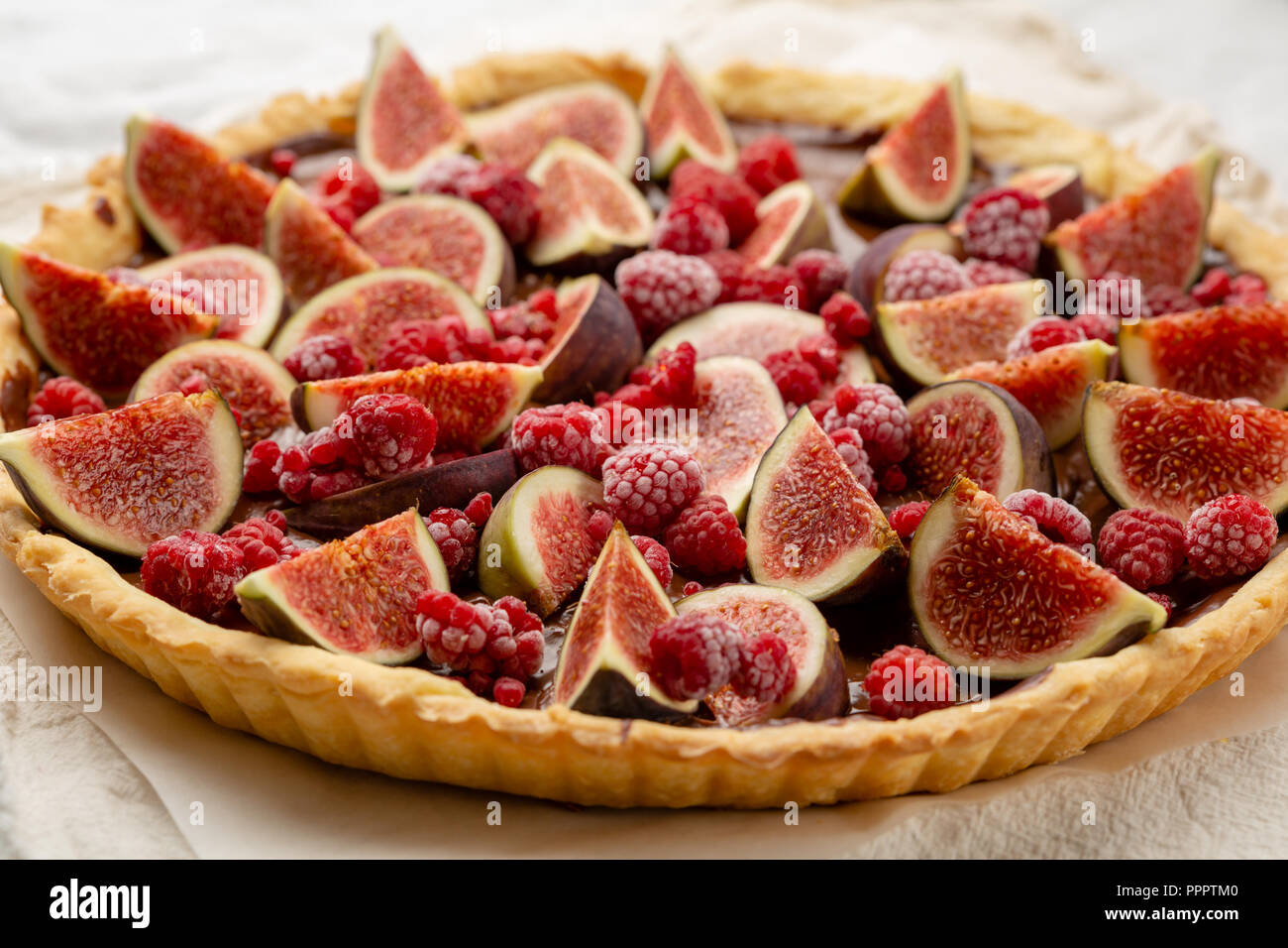 Sweet pie with raspberry and figs Stock Photo - Alamy