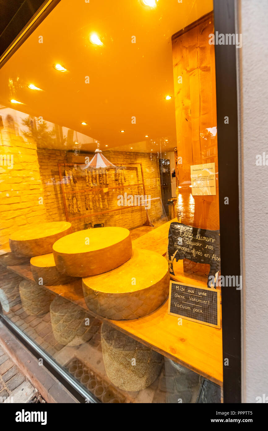 Cheese rounds in a cheese shop window. Strasbourg, France Stock Photo ...
