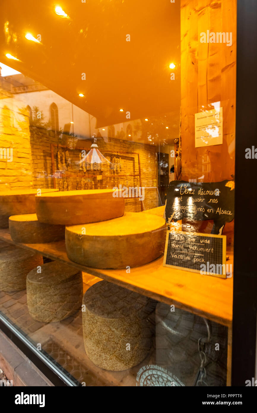Cheese rounds in a cheese shop window. Strasbourg, France Stock Photo ...