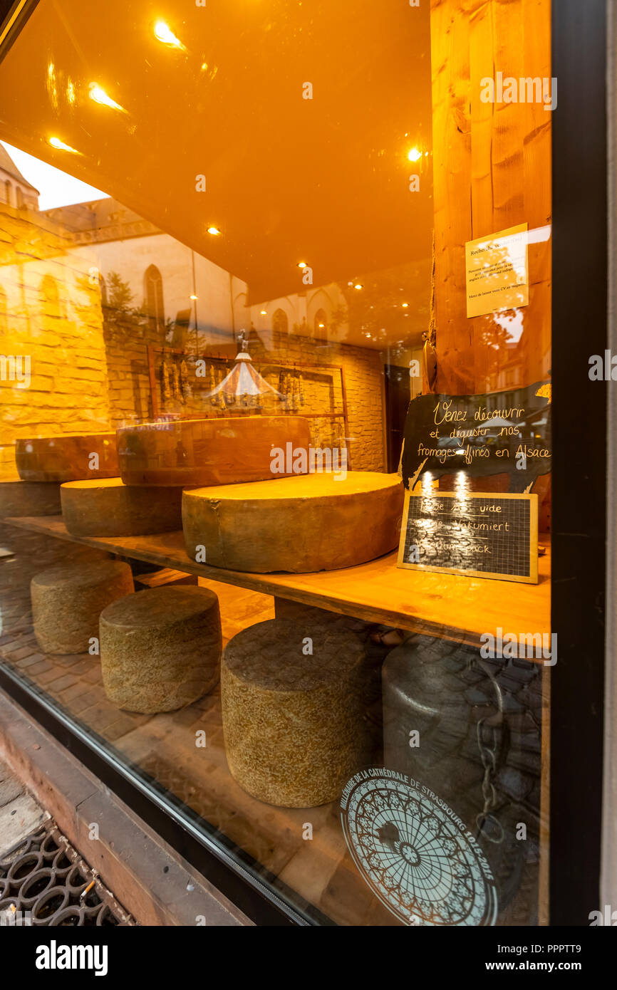 Cheese rounds in a cheese shop window. Strasbourg, France Stock Photo ...