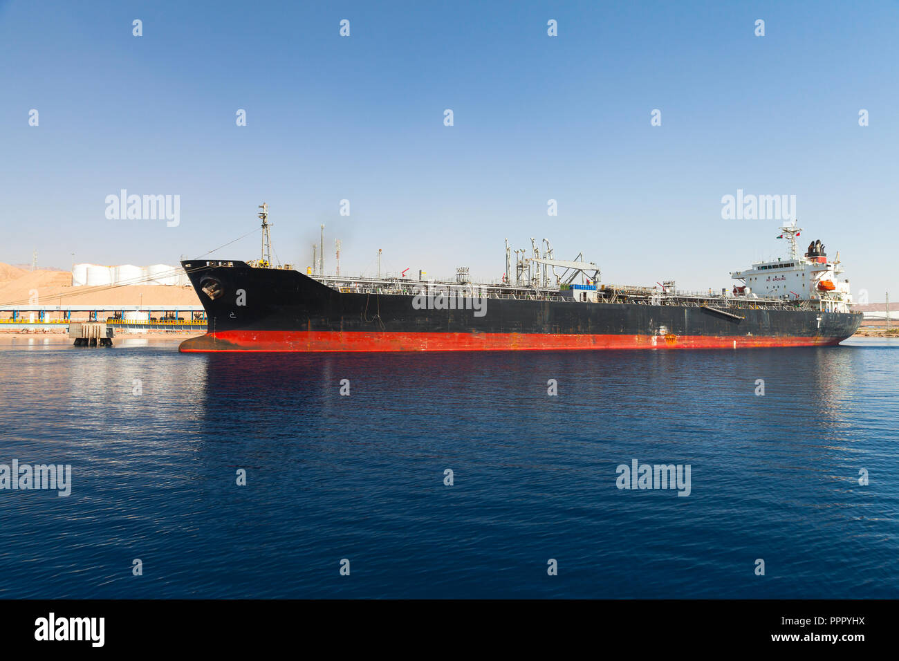 Oil tanker loading in new port of Aqaba, Jordan Stock Photo - Alamy