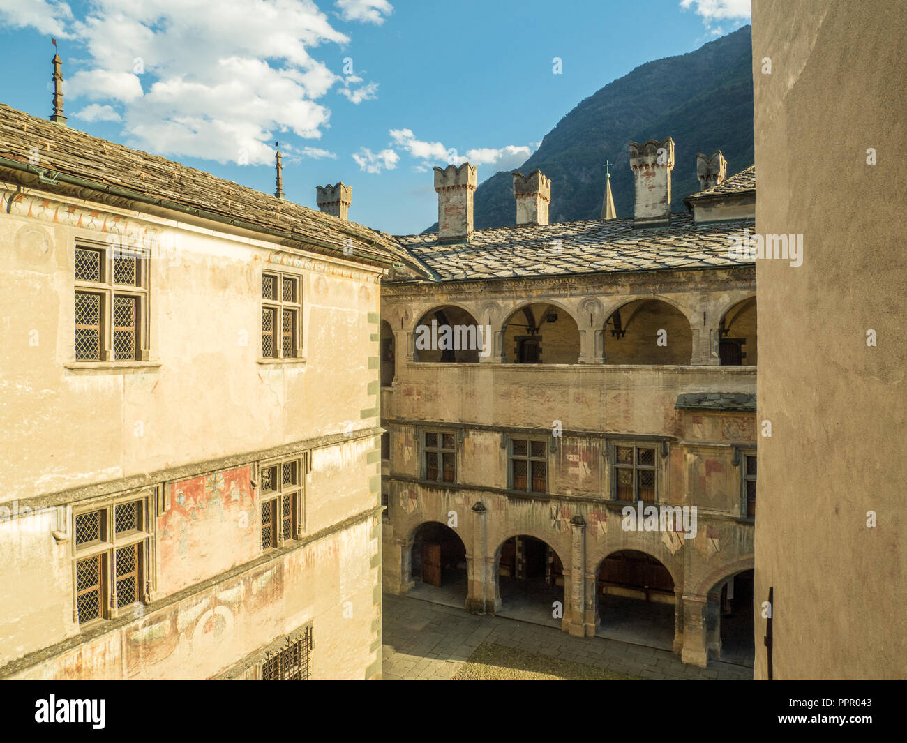 Courtyard in Issogne Castle, a Castle/Manor in the town of Issogne in ...