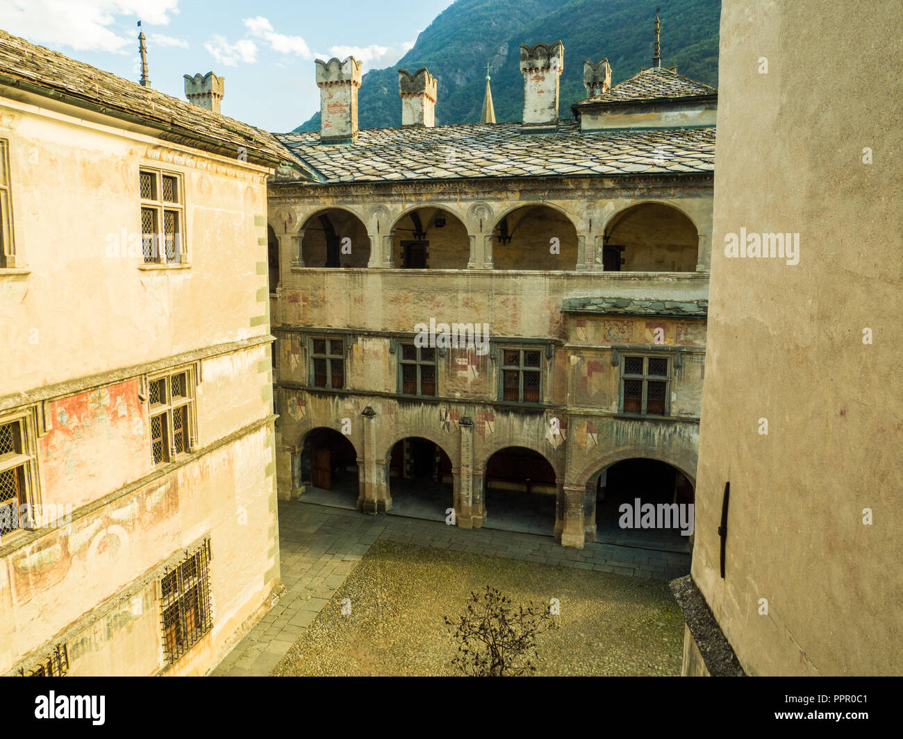 Courtyard in Issogne Castle, a Castle/Manor in the town of Issogne in ...