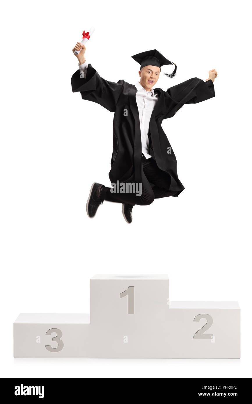 Male graduate jumping from a winner's pedestal isolated on white ...