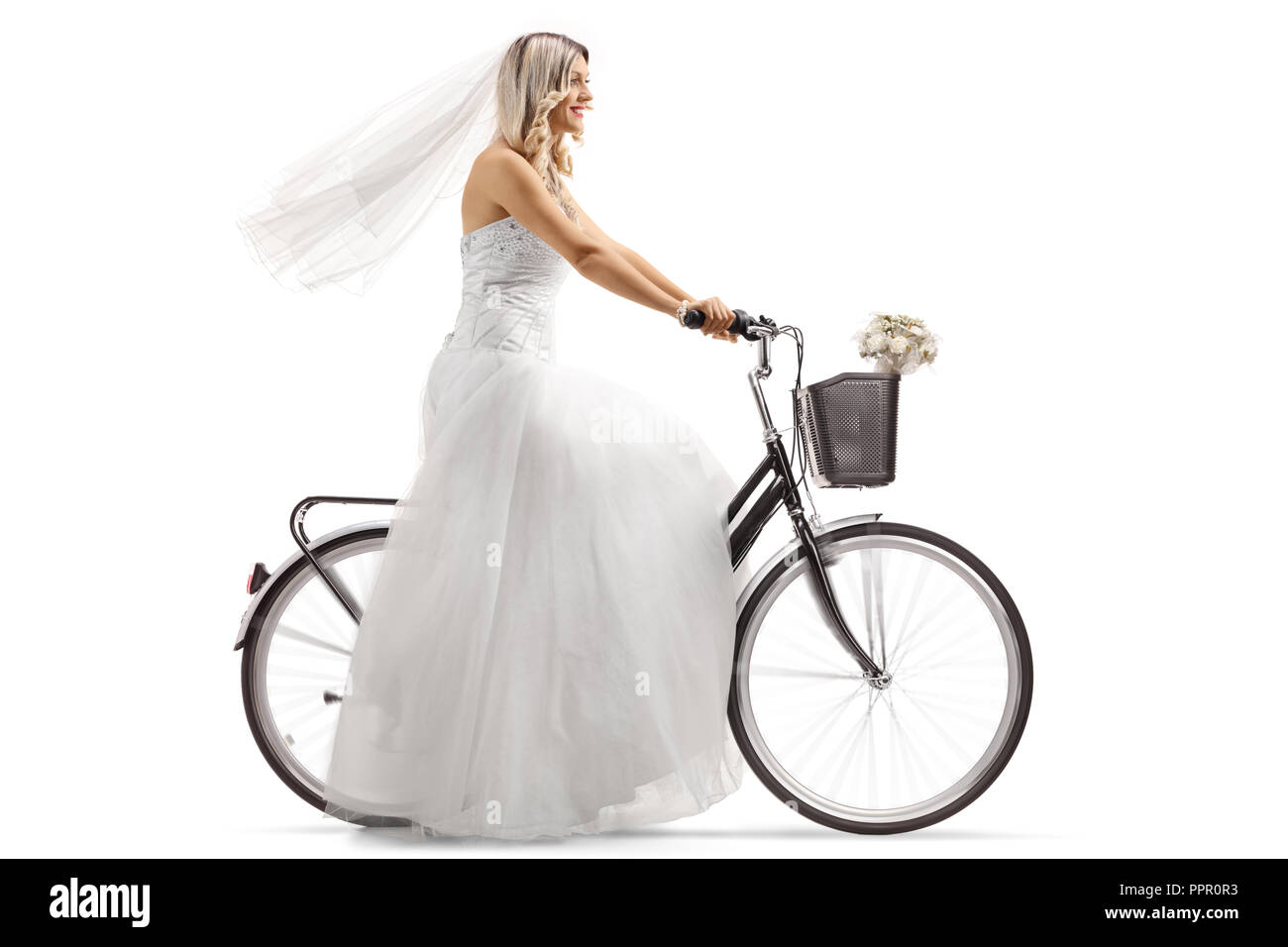 Young bride riding a bicycle isolated on white background Stock Photo ...
