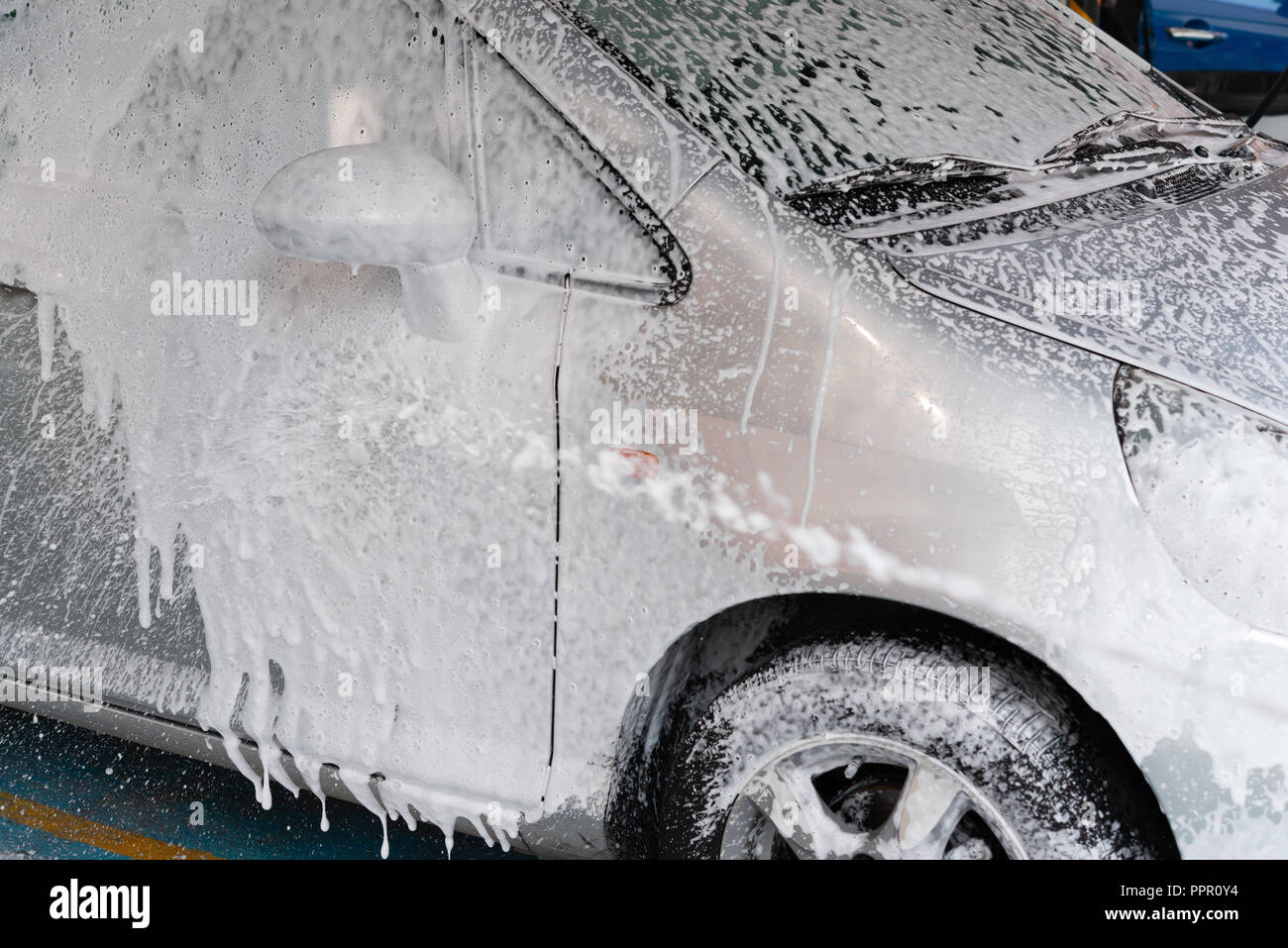 washing a car with soapy liquid Stock Photo - Alamy