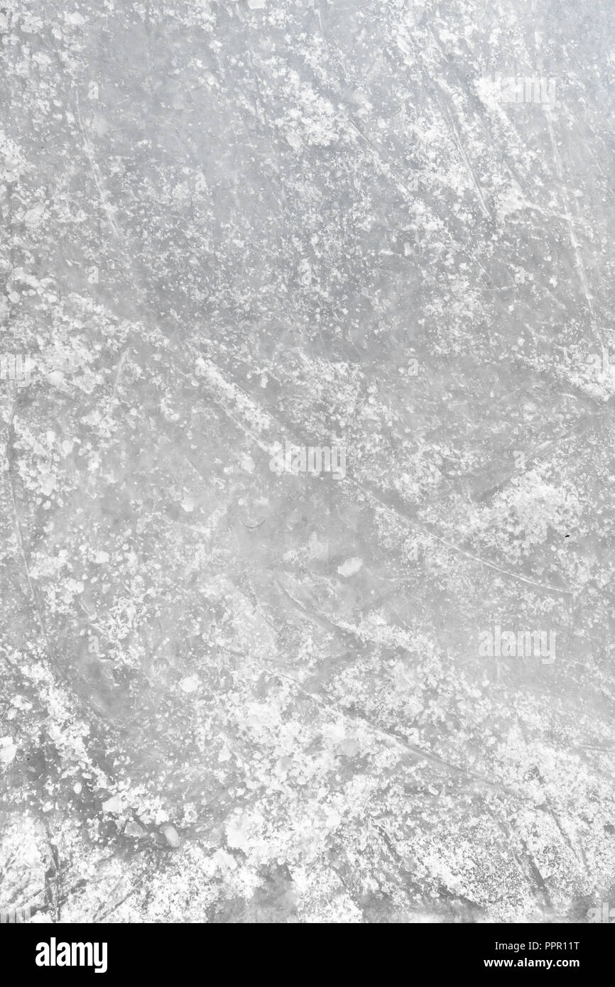 Ice rink floor, detail of a textured background ice. Sports and seasons ...