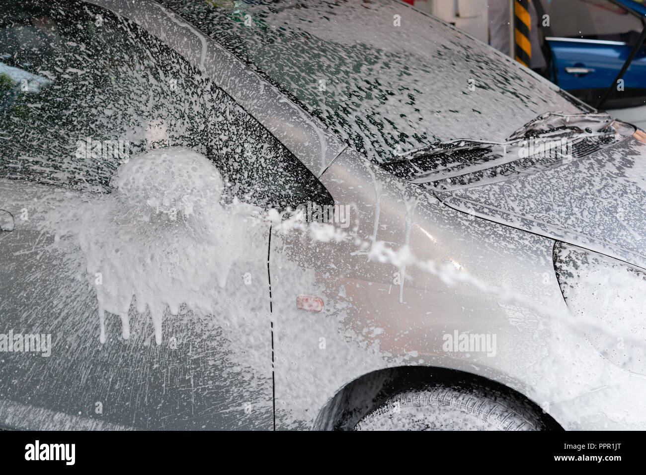 washing a car with soapy liquid Stock Photo - Alamy