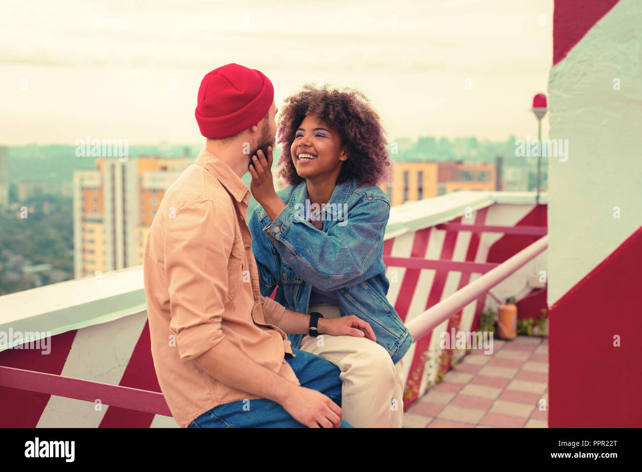Woman touching boyfriend face with hand hi-res stock photography and ...