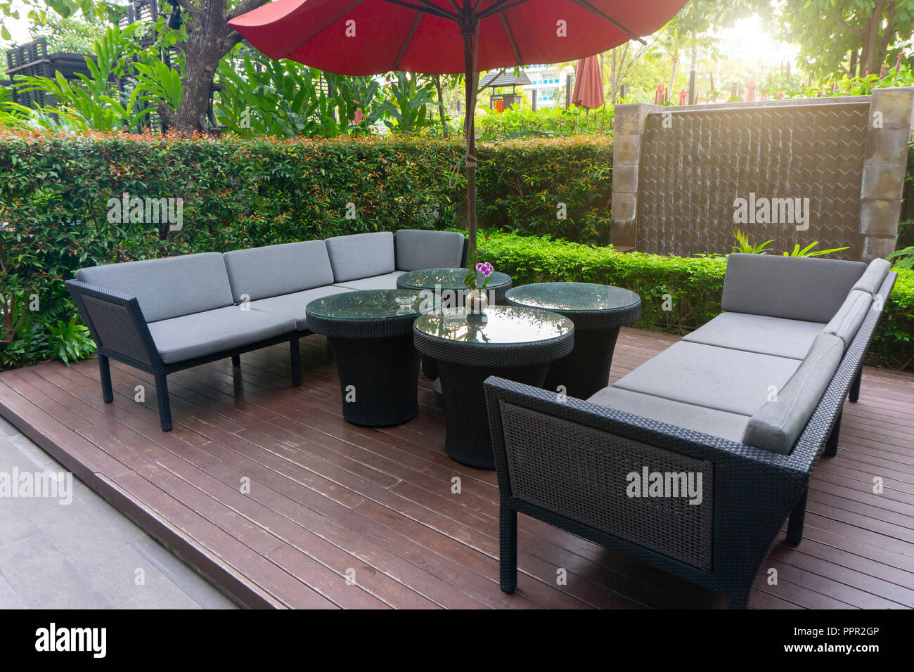 Empty tables at an outdoor restaurant in hotel resort in summertime ...
