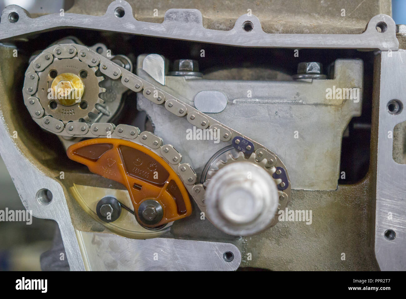 Detail of the car engine with gears and chain. Close up Stock Photo - Alamy