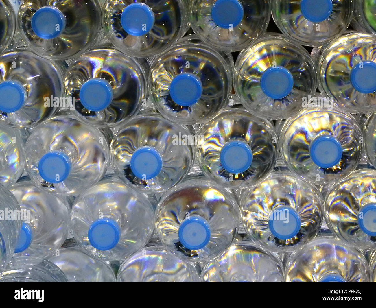 Close Up on mineral water bottles in top view Stock Photo - Alamy