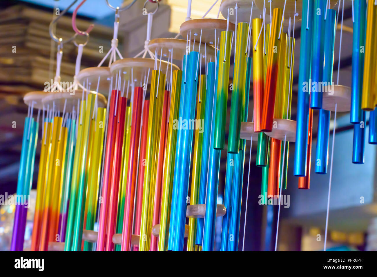 The mobile is colorful and sounding. a decoration made of small objects ...