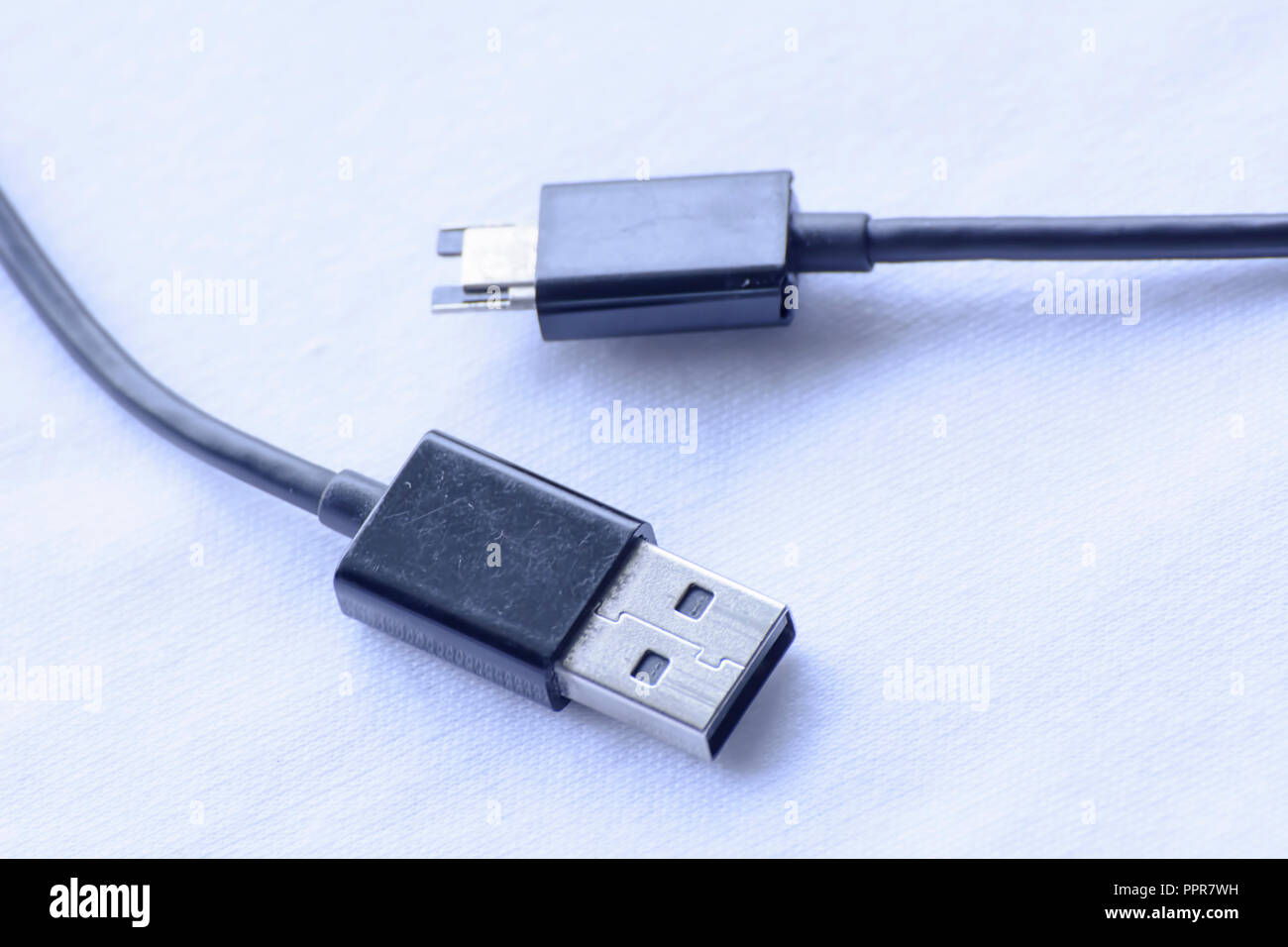 Usb cable for smartphone isolated on white background Stock Photo - Alamy