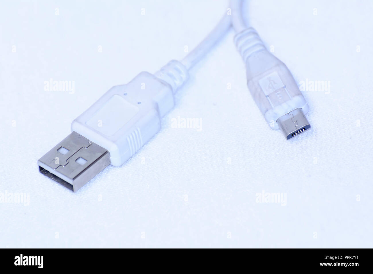 Usb cable for smartphone isolated on white background Stock Photo - Alamy