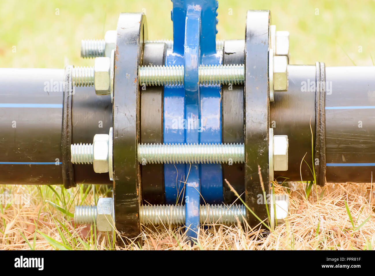 Big water pipe and valve in the street Stock Photo - Alamy