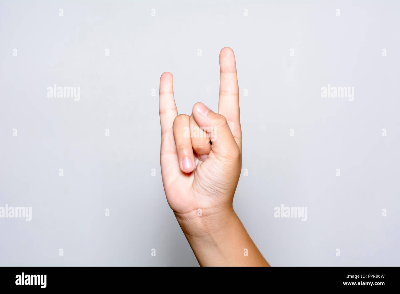 Devil Hand Sign High Resolution Stock Photography and Images - Alamy