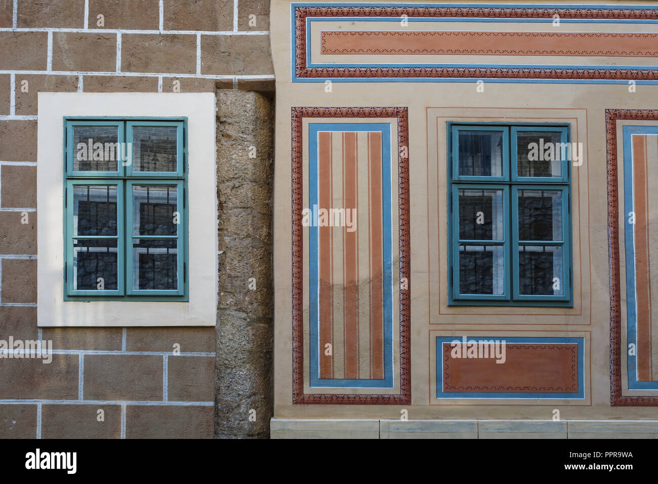 Wall and windows of historical buildings in the old town of Buda in ...