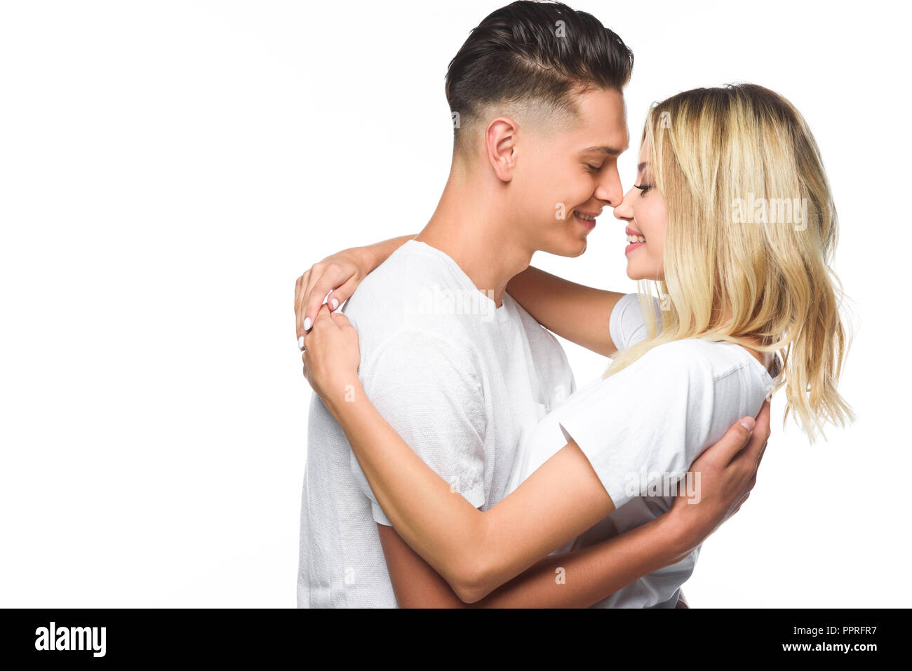 Affectionate couple hugging hi-res stock photography and images - Alamy