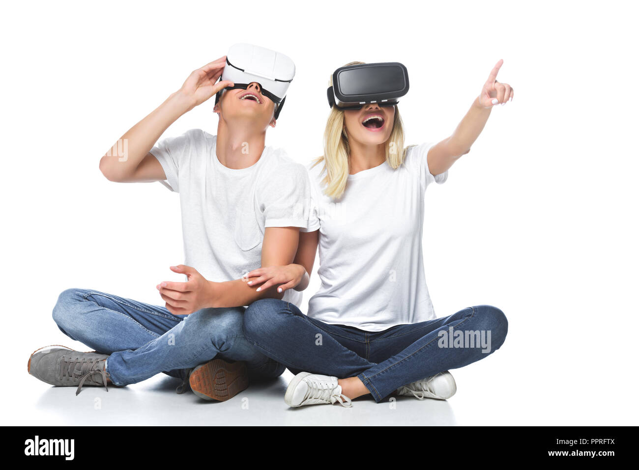 couple using virtual reality headsets isolated on white, girlfriend ...