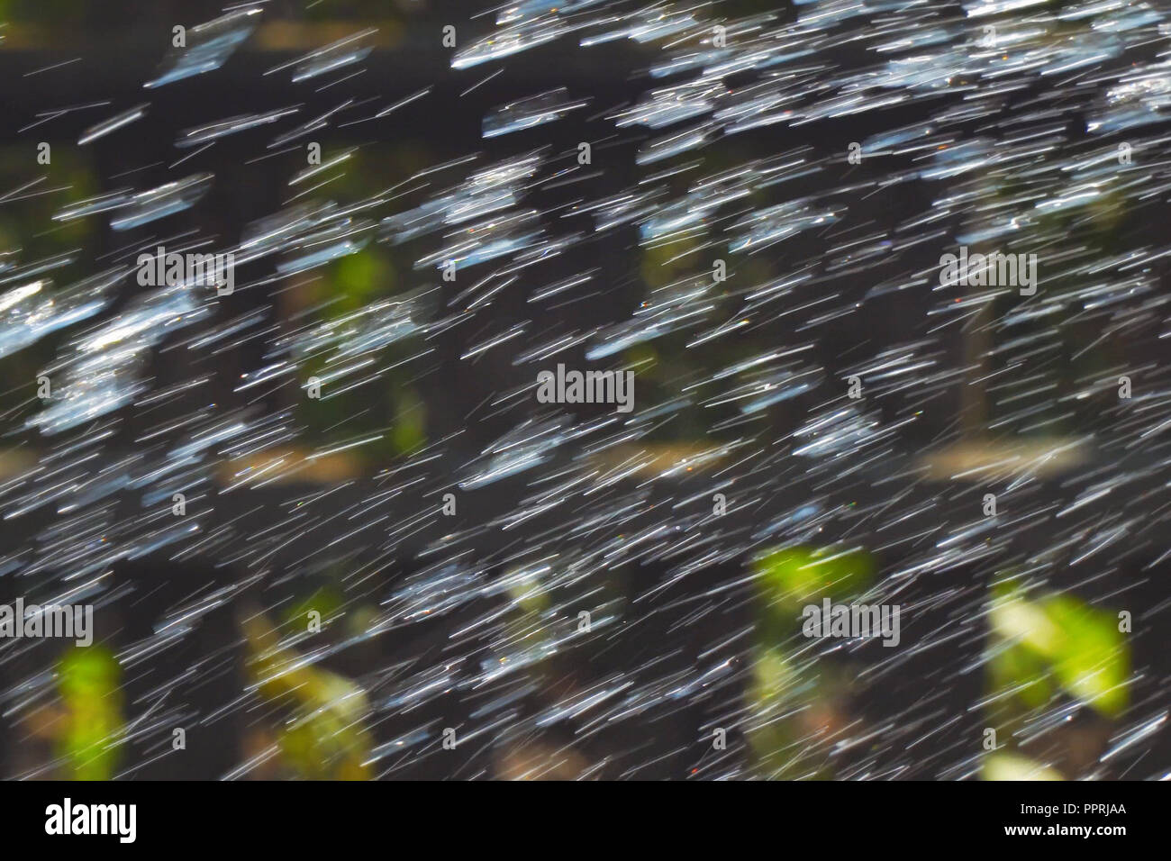 Abstract view of drops and splashing water Stock Photo - Alamy