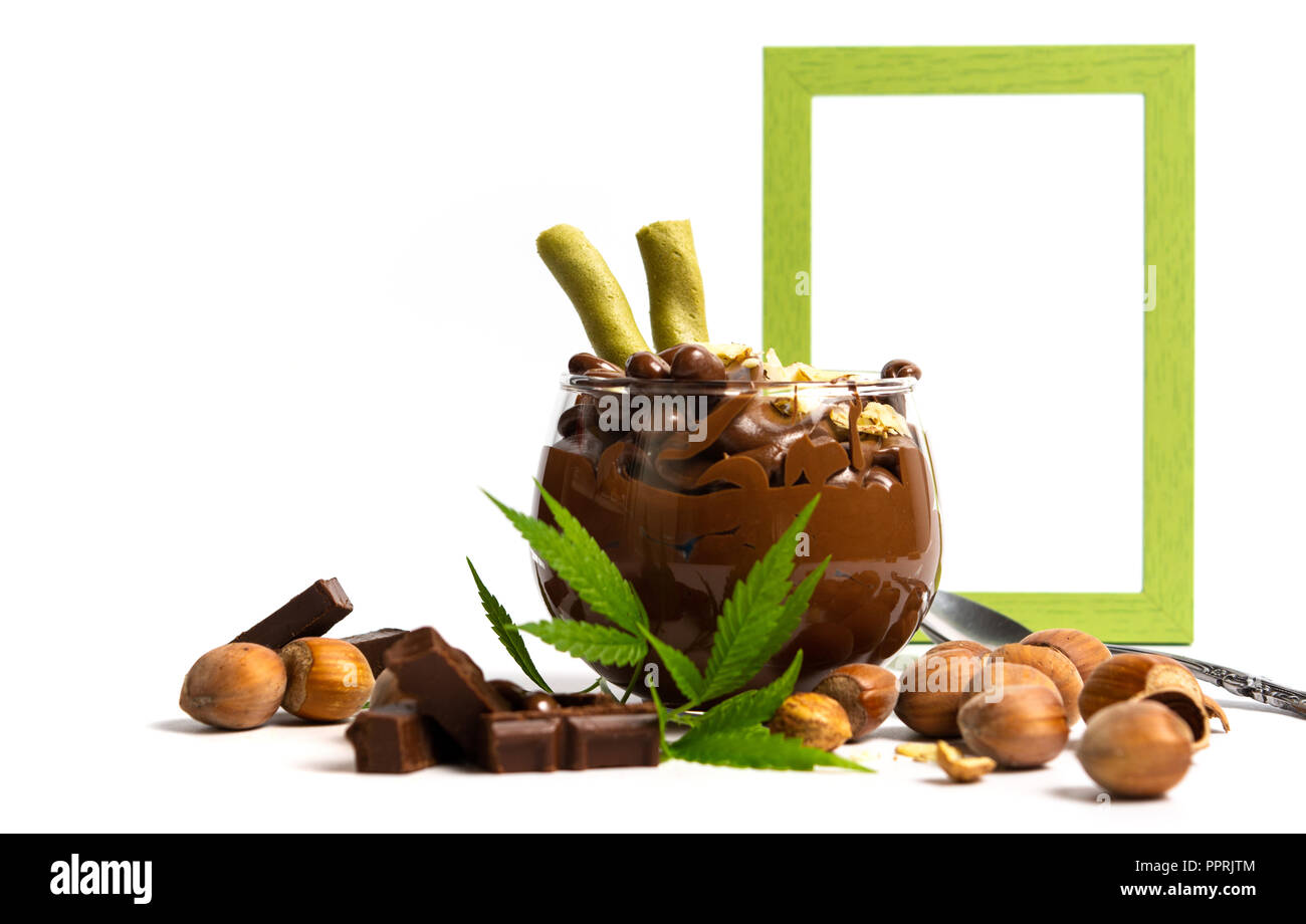Hazelnut spread with marijuana leaves in a jar isolated Stock Photo - Alamy