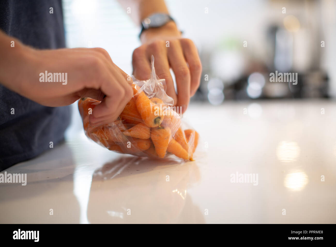 Plastic wrapped fruit hi-res stock photography and images - Alamy