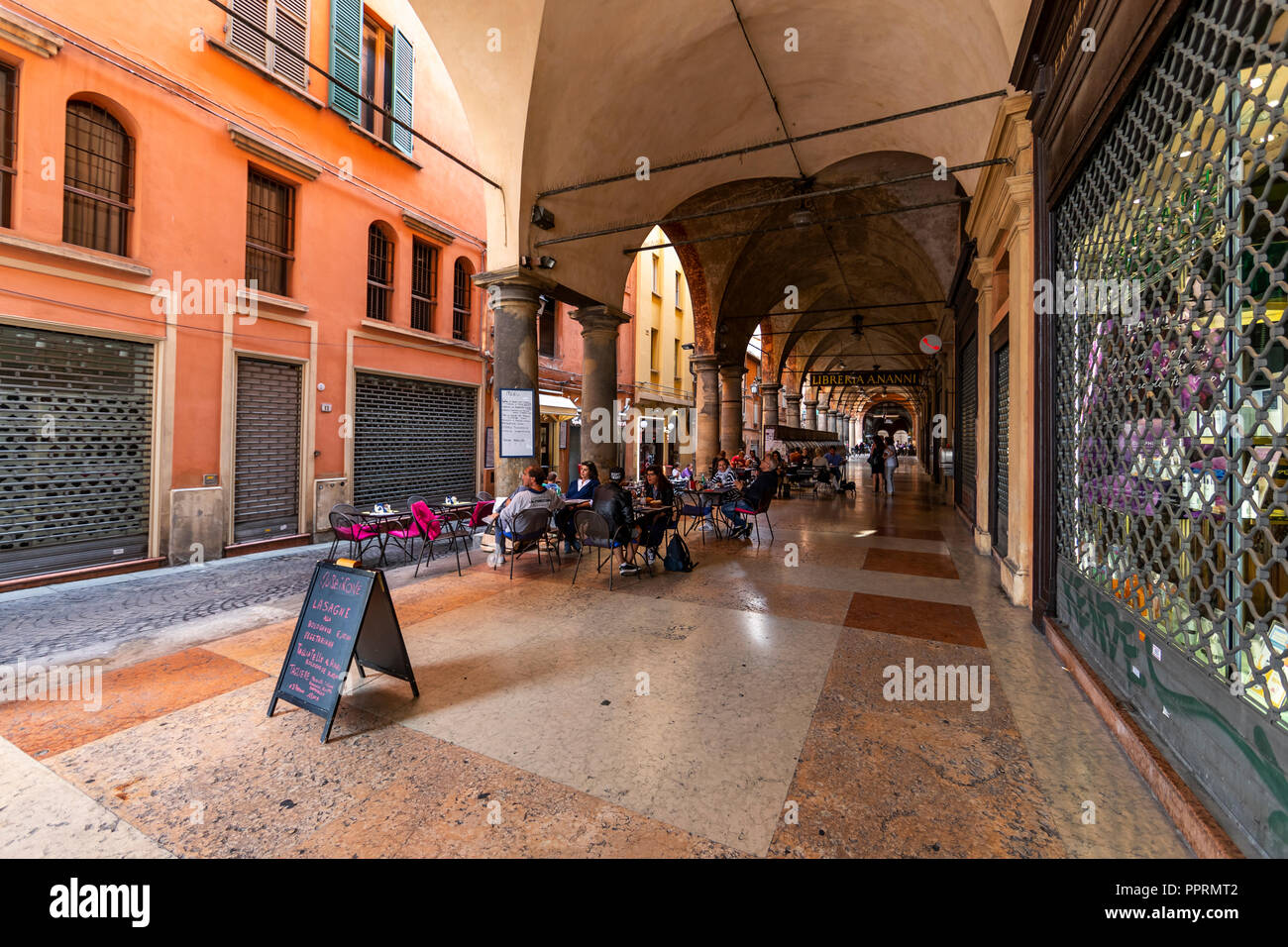 Cafe life under the colonnades, Bologna, Italy Stock Photo - Alamy
