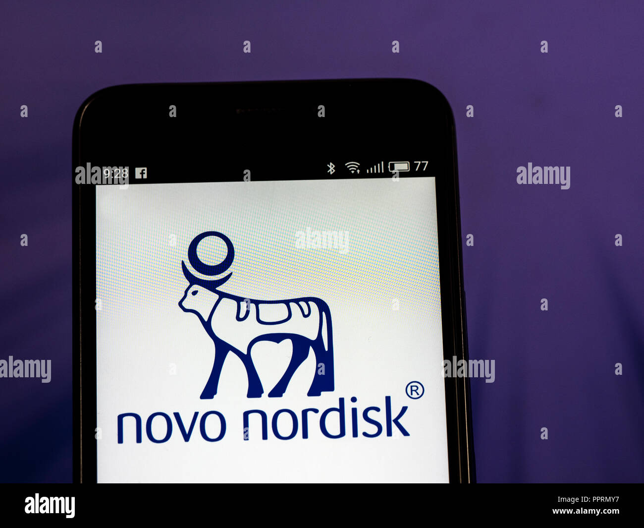Novo Nordisk logo seen displayed on smart phone. Novo Nordisk A/S is a ...