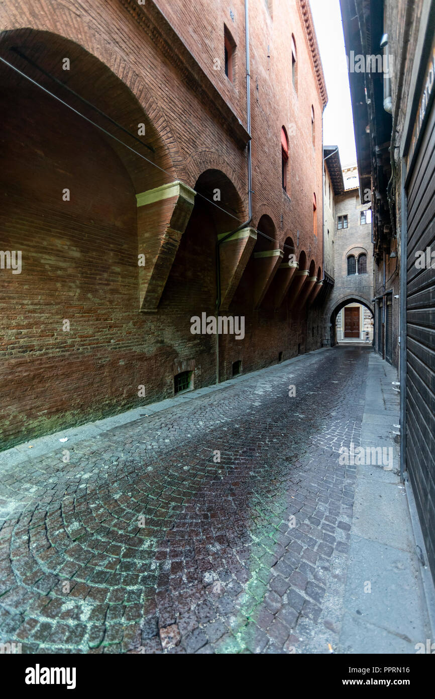 Architectural projections on the first floor of Bologna's medieval ...