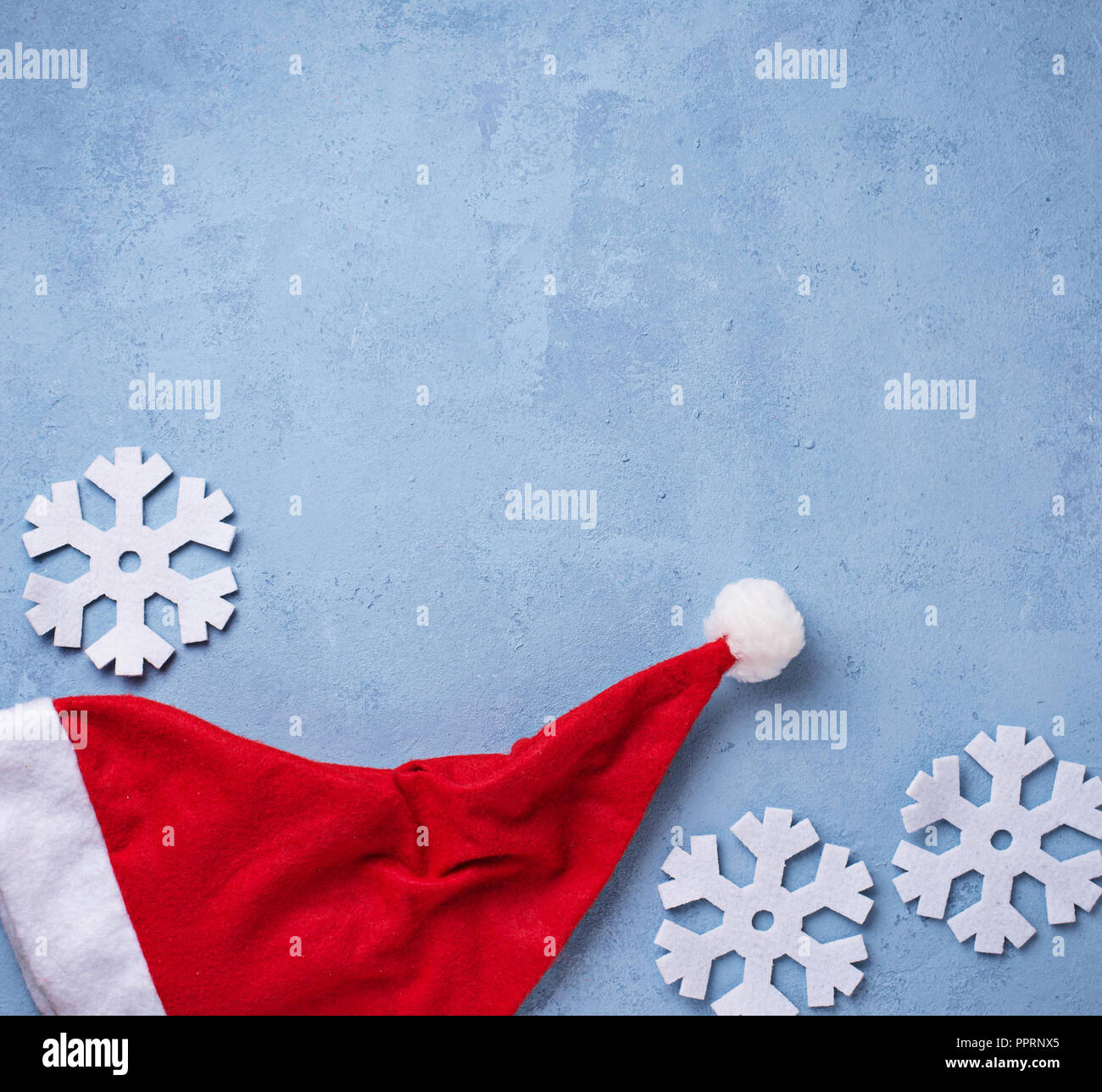 Christmas background with Santa hat Stock Photo - Alamy