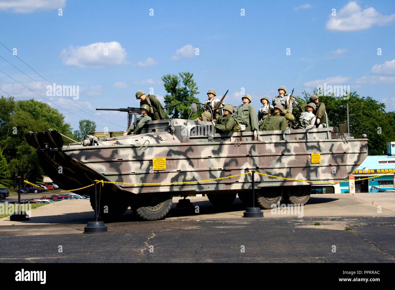 Amphibious Dells Army Duck filled with military mannequins advertising ...