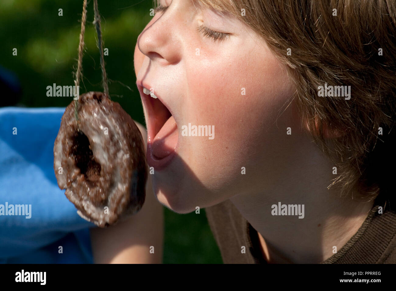 Doughnut hanging string hi-res stock photography and images - Alamy Doughnut hanging string hi-res stock photography and images - Alamy