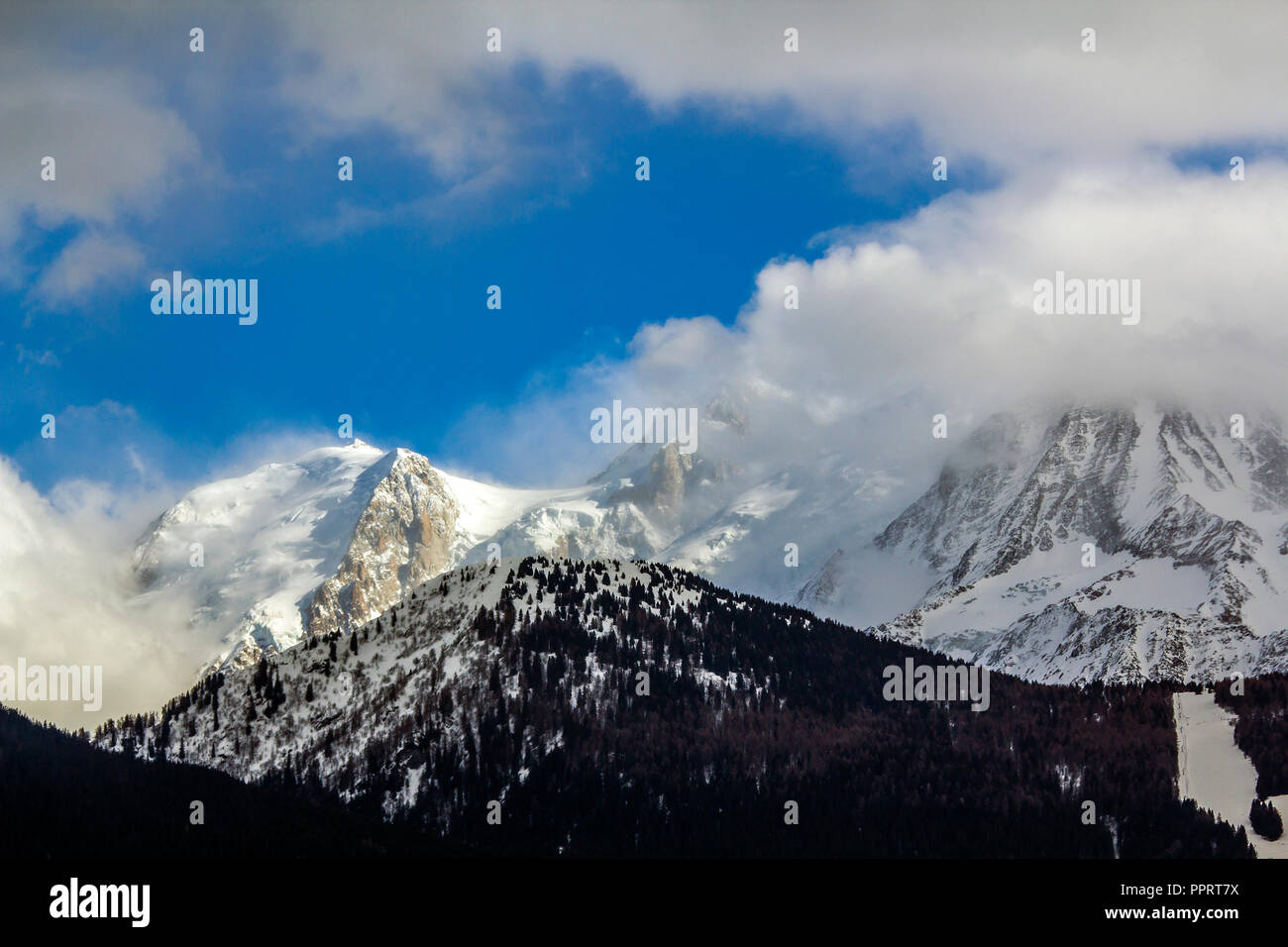 Breathtaking aerial view of Mont Blanc mountain peak covered with shiny ...