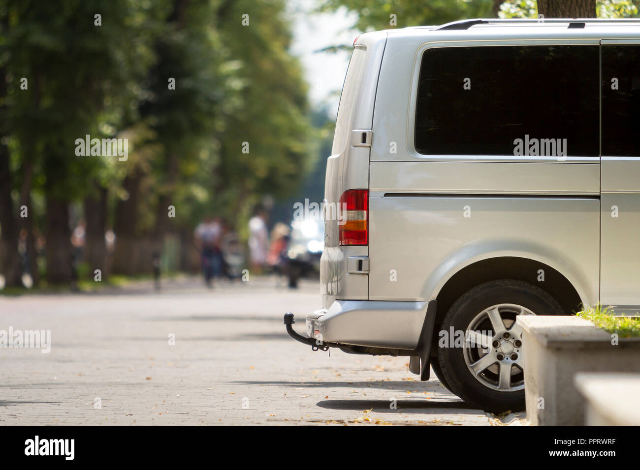 Side view detail of white passenger medium size luxury minibus van ...