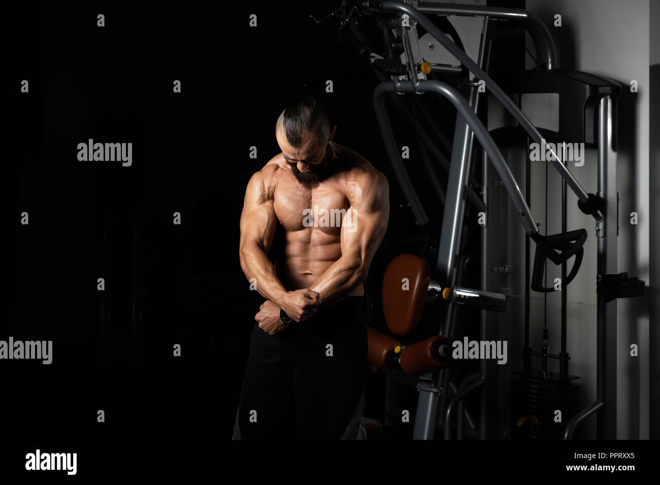 Beard Man Posing In Different Poses Demonstrating His Muscles - Male ...