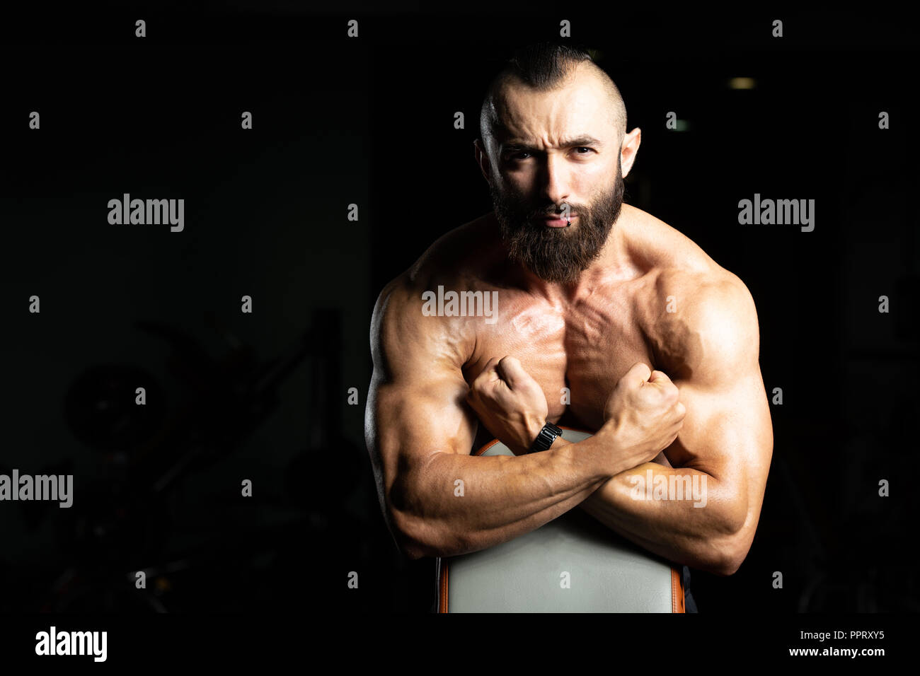 Beard Man Posing In Different Poses Demonstrating His Muscles - Male ...