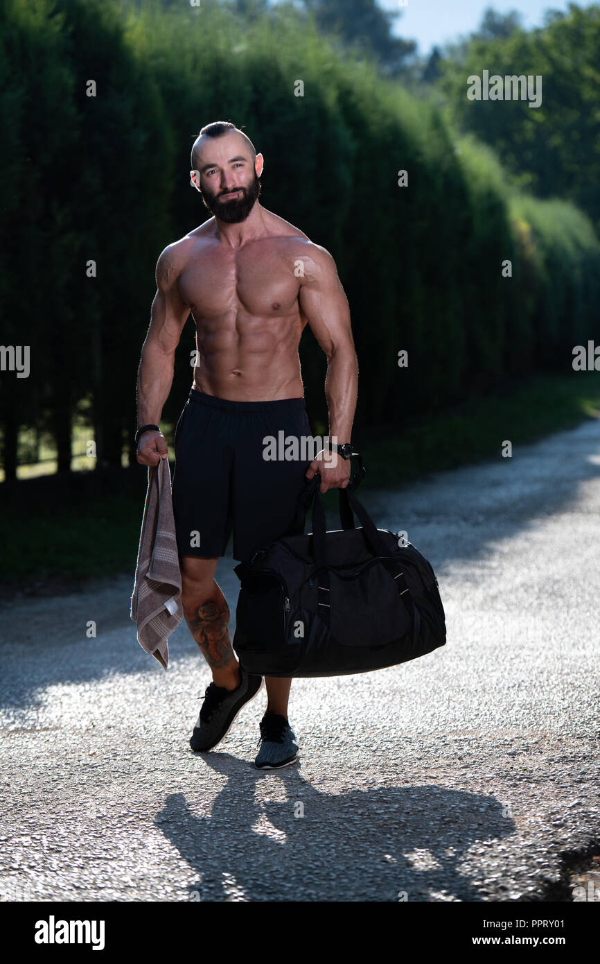 Guy gym bag hi-res stock photography and images - Alamy