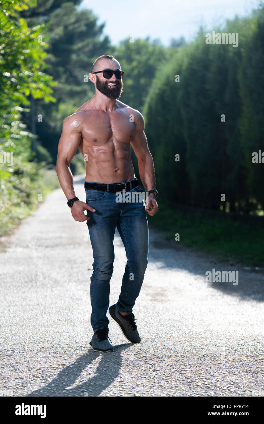 Handsome Beard Man Standing Strong and Posing at Outdoors - Background ...