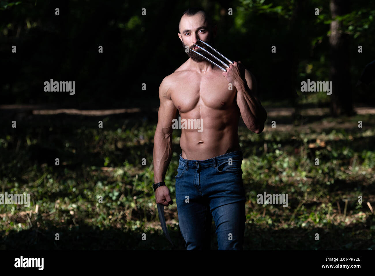 Wolverine claws hi-res stock photography and images - Alamy