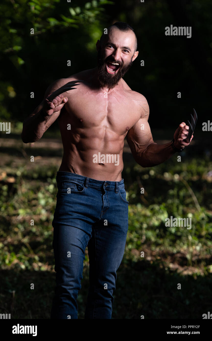 Wolverine claws hi-res stock photography and images - Alamy