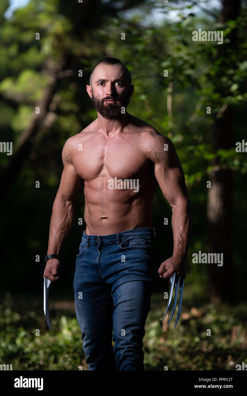 Superhero With Claws Standing Strong Flexing Muscles - Muscular ...