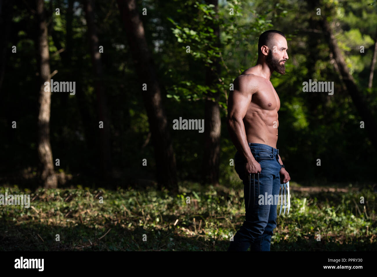 Superhero With Claws Standing Strong Flexing Muscles - Muscular ...