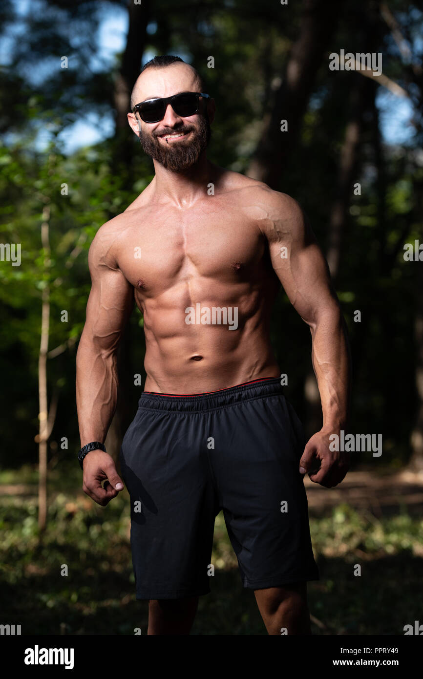 Handsome Beard Man Standing Strong and Posing at Outdoors - Background ...