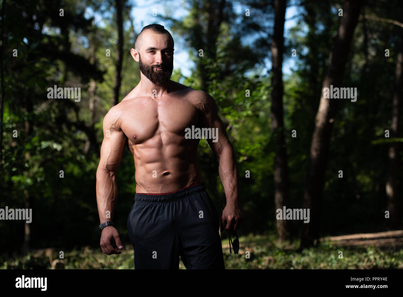 Handsome Beard Man Standing Strong and Posing at Outdoors - Background ...