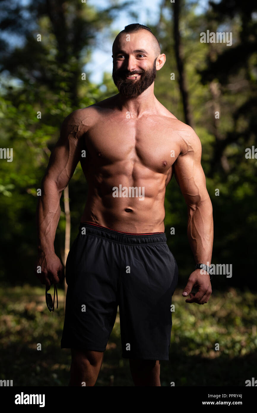 Handsome Beard Man Standing Strong and Posing at Outdoors - Background ...