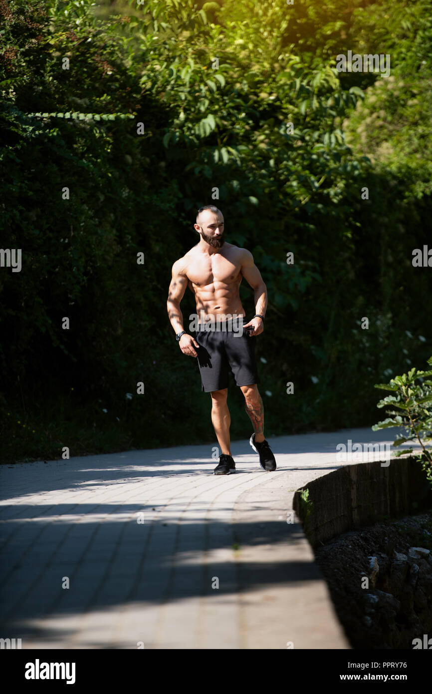 Handsome Beard Man Standing Strong and Posing at Outdoors - Background ...