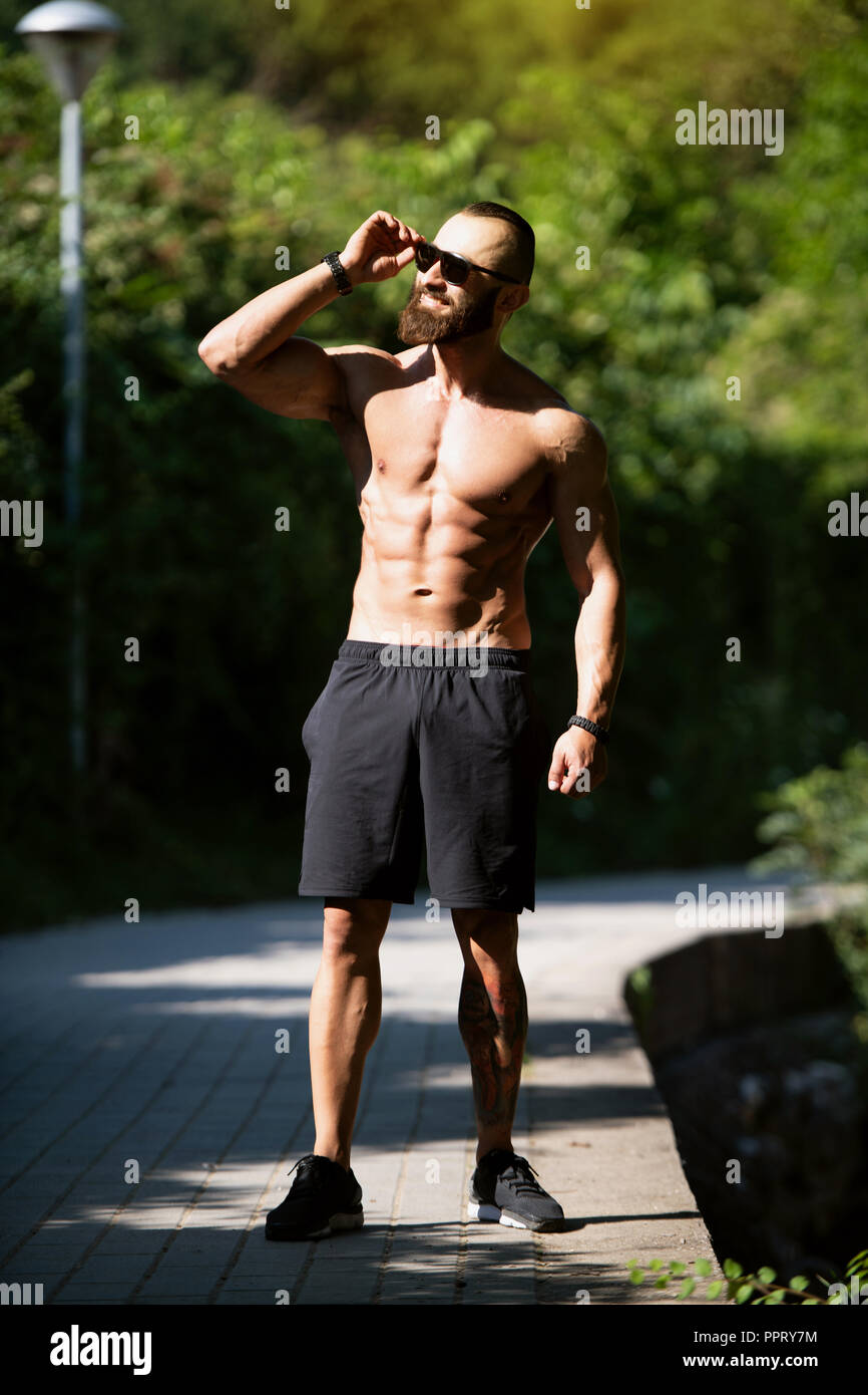 Handsome Beard Man Standing Strong and Posing at Outdoors - Background ...
