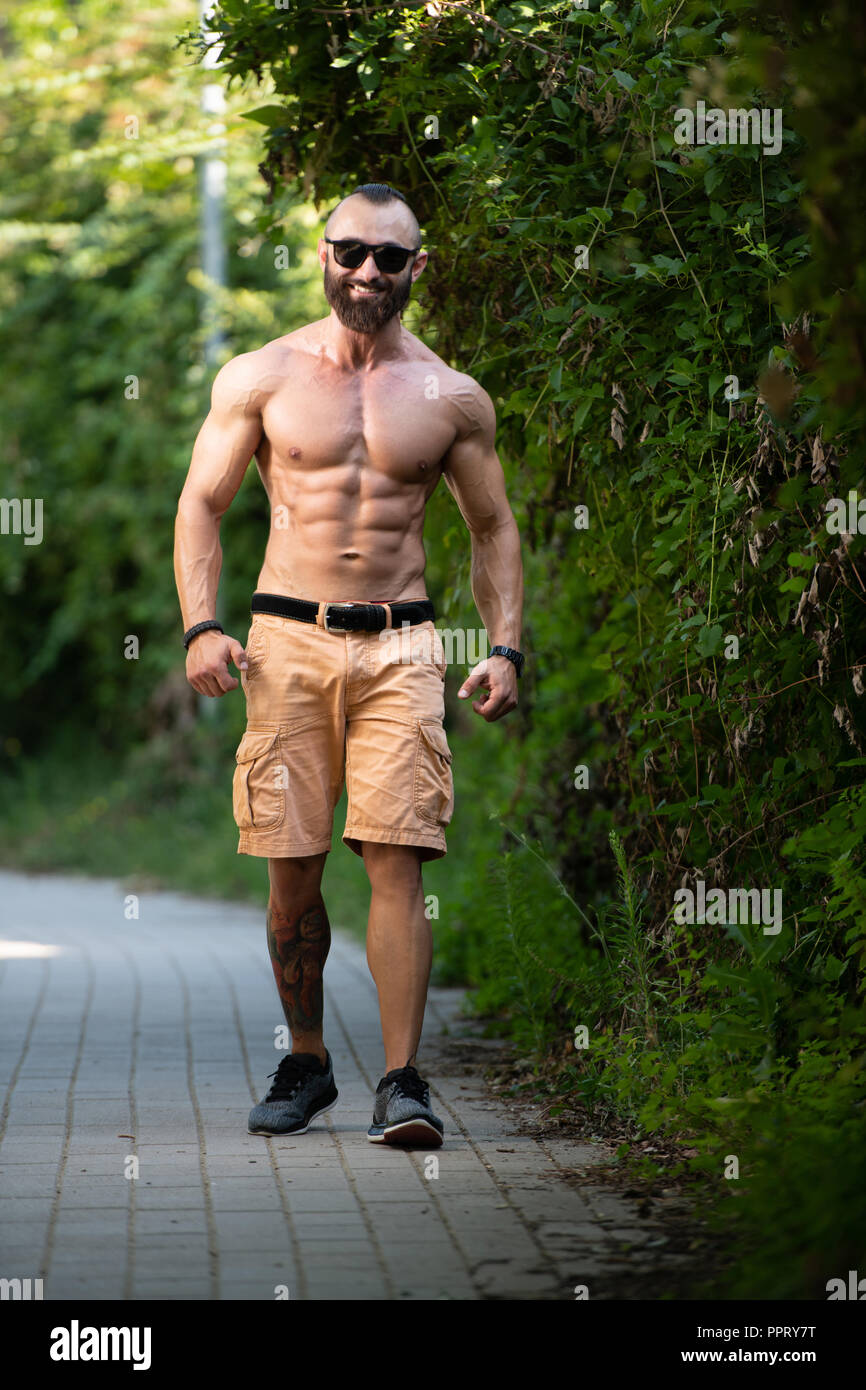 Handsome Beard Man Standing Strong and Posing at Outdoors - Background ...