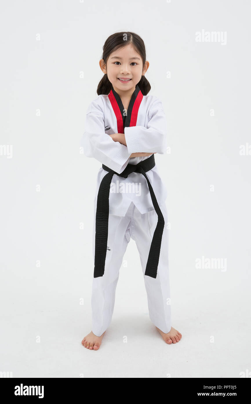 Children education. Taekwondo, little boy and girl practice martial ...